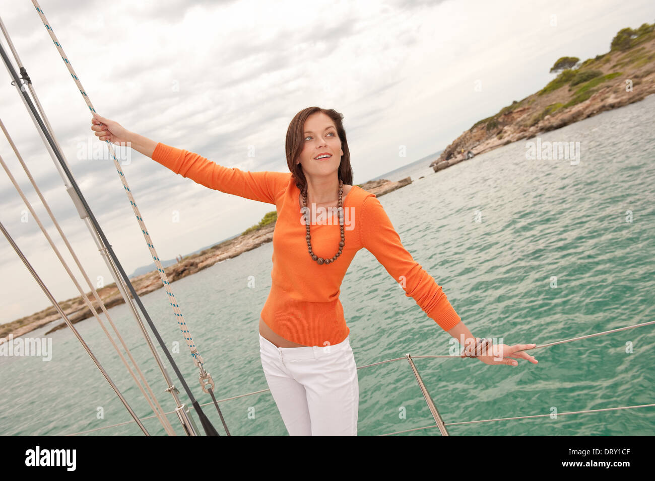 Attractive woman sailing on luxury yacht Stock Photo - Alamy
