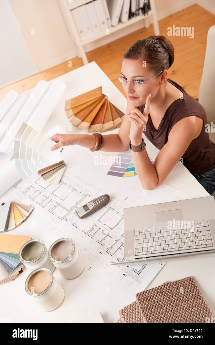 Successful interior designer woman at office Stock Photo - Alamy