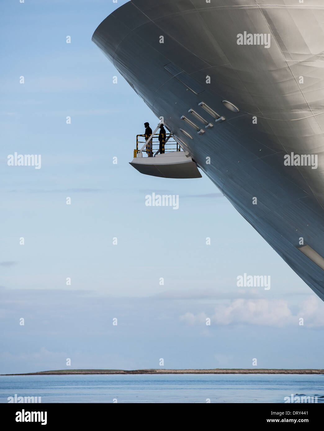 People standing on viewing platform on large cruise ship, Reykjavik ...