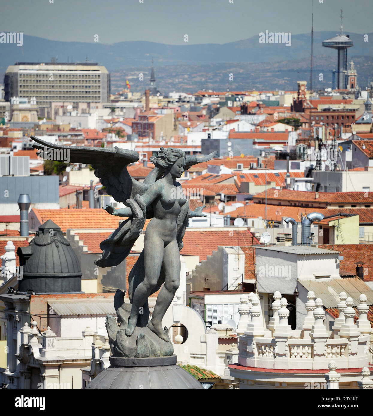 Winged victory statue at the top of the Metropolis building. Gran Via ...
