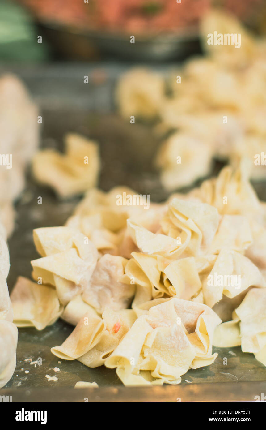 making of wanton or wantan, a chinese dumplings Stock Photo - Alamy