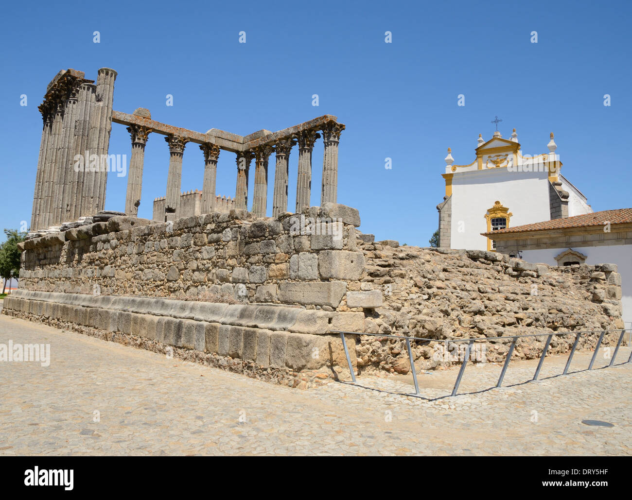 Roman ruins in a square located in the historical center of Evora ...