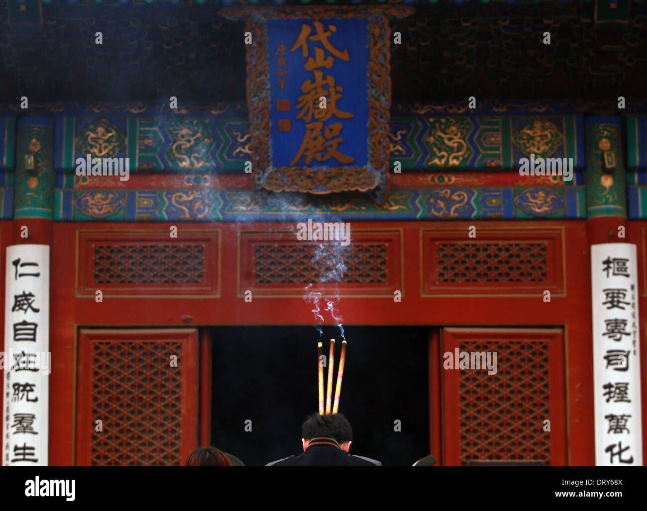 Beijing, CHINA, China. 31st Jan, 2014. Chinese light incense sticks and ...