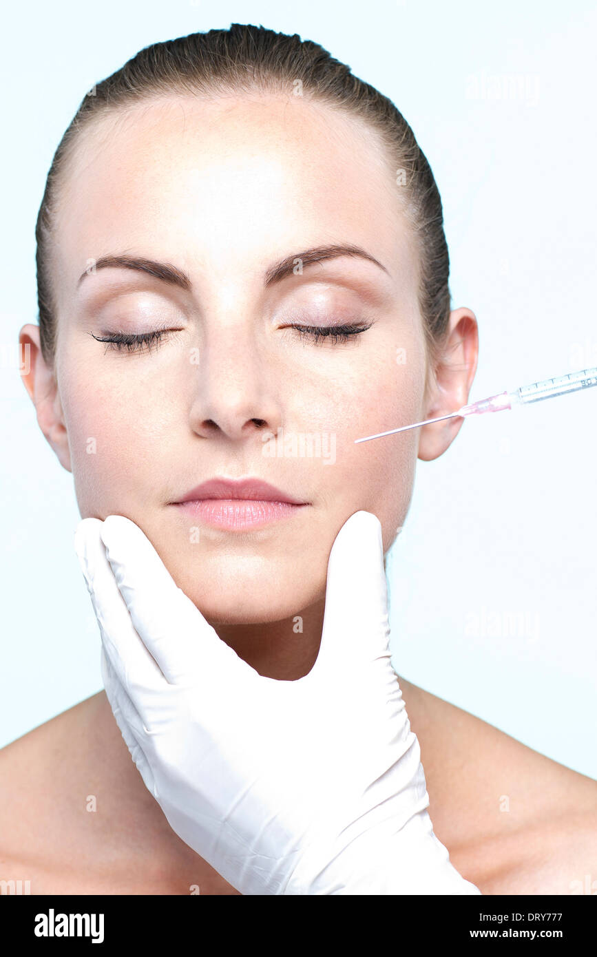 Woman receiving collagen injection Stock Photo - Alamy