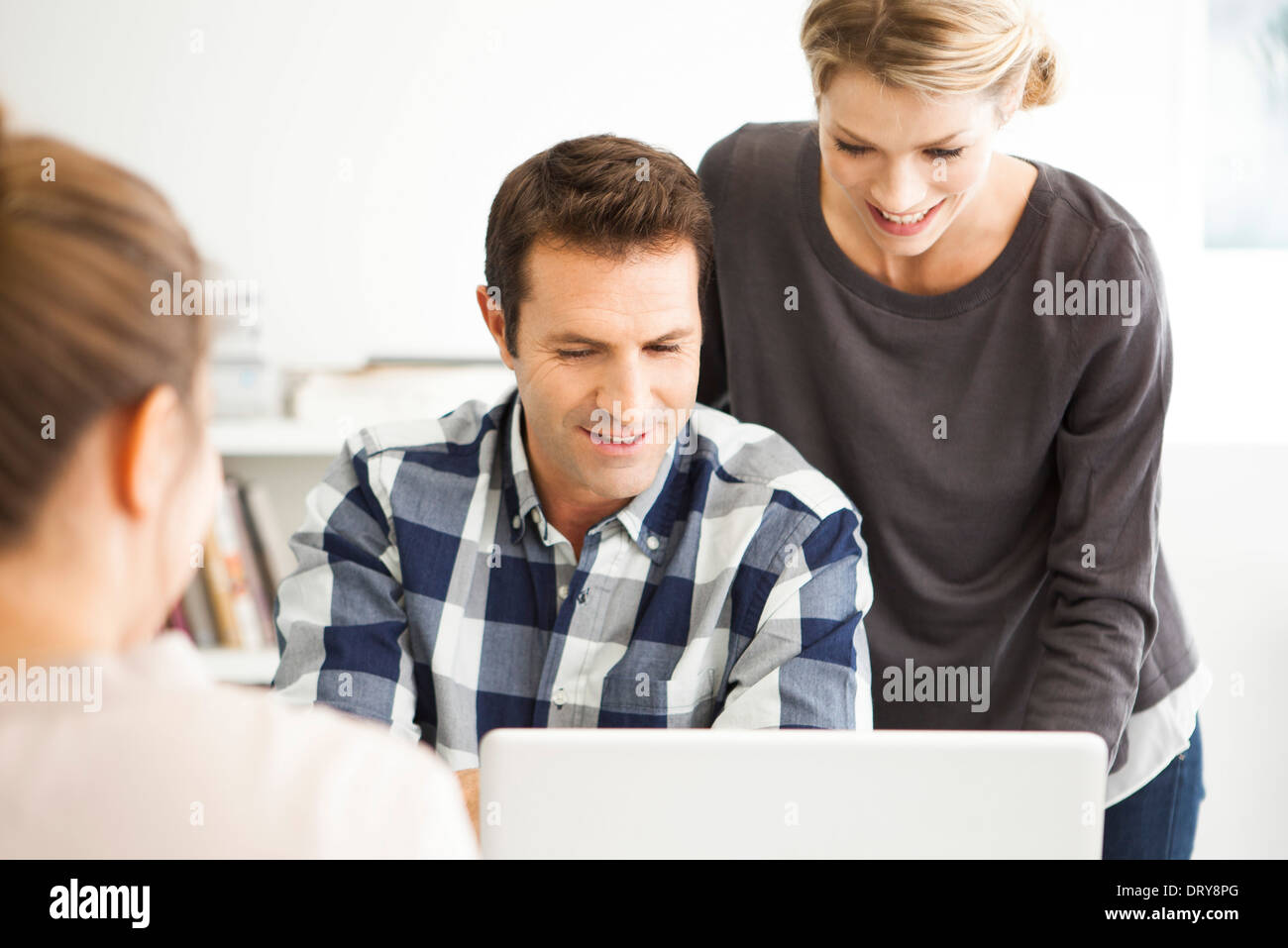 Collaborating computers hi-res stock photography and images - Alamy