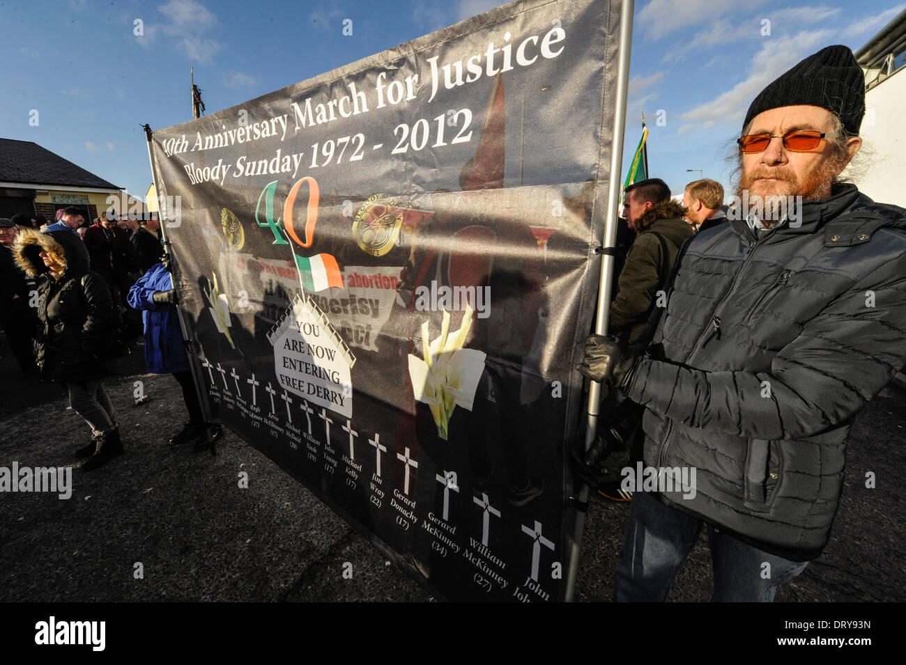 Banner carried at the 42nd anniversary of Bloody Sunday march in Derry ...