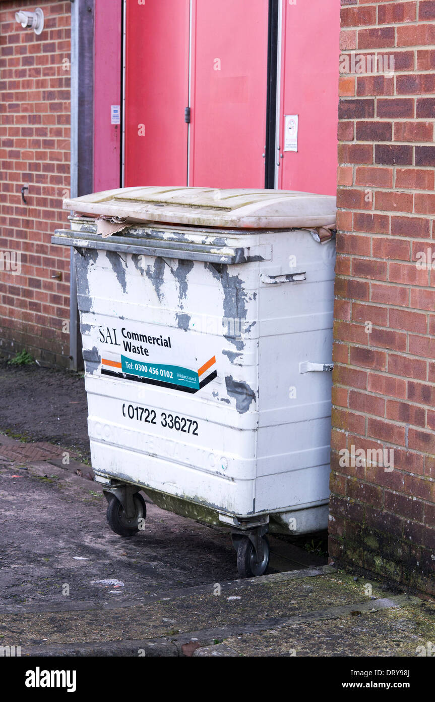 Commercial waste wheelie bin at the back of a UK store Stock Photo - Alamy