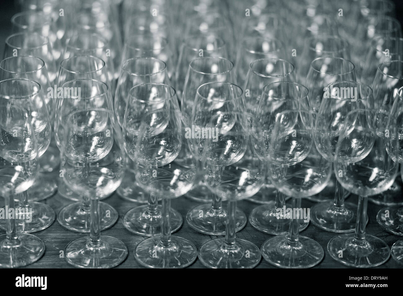 Glasses arranged in rows Stock Photo - Alamy