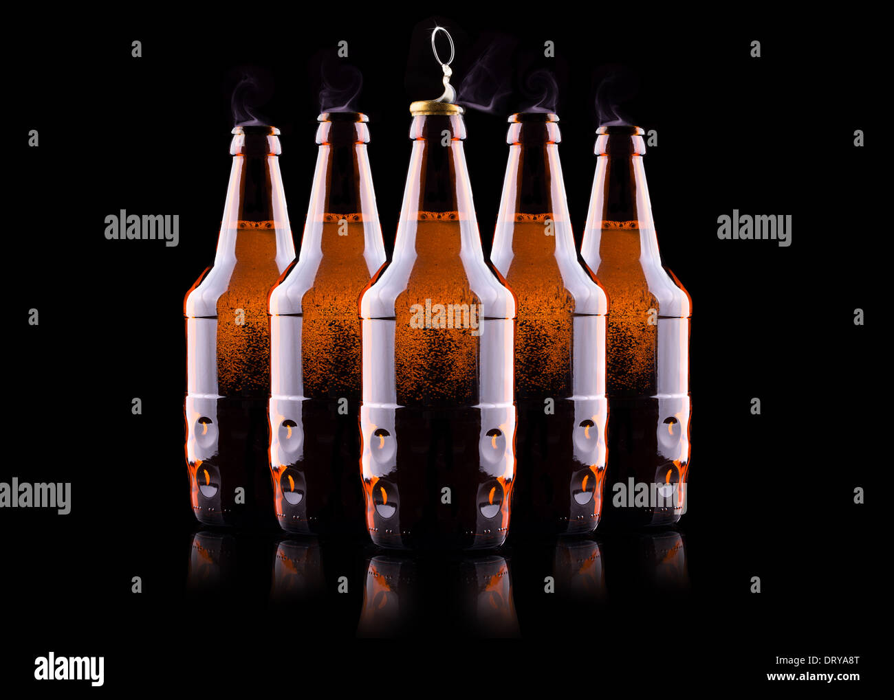 open wet beer bottle isolated on black Stock Photo - Alamy