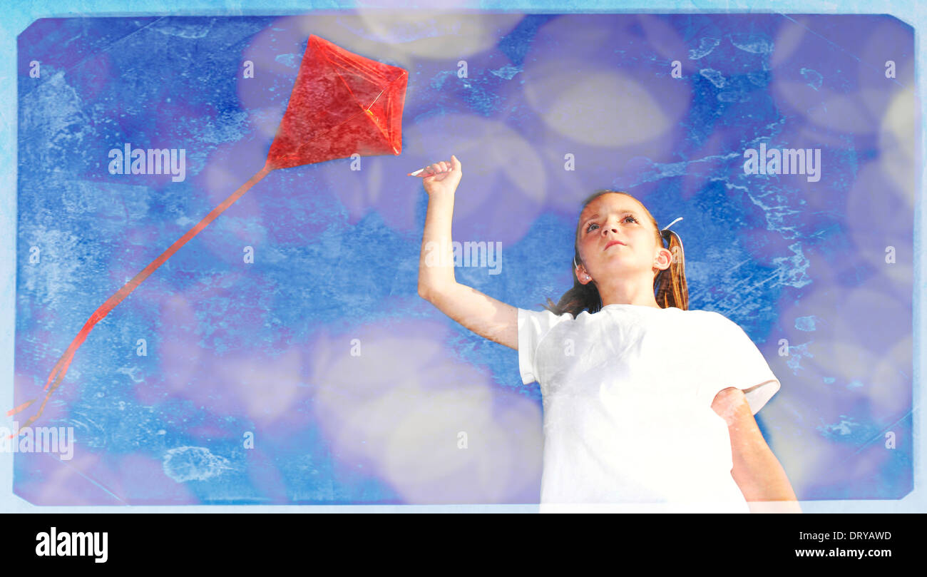 Girl flying a kite in a park with blue sky and texture Stock Photo - Alamy