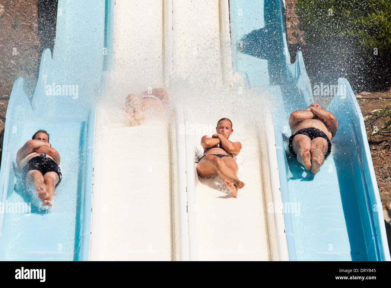 People having fun, sliding at water park Stock Photo - Alamy