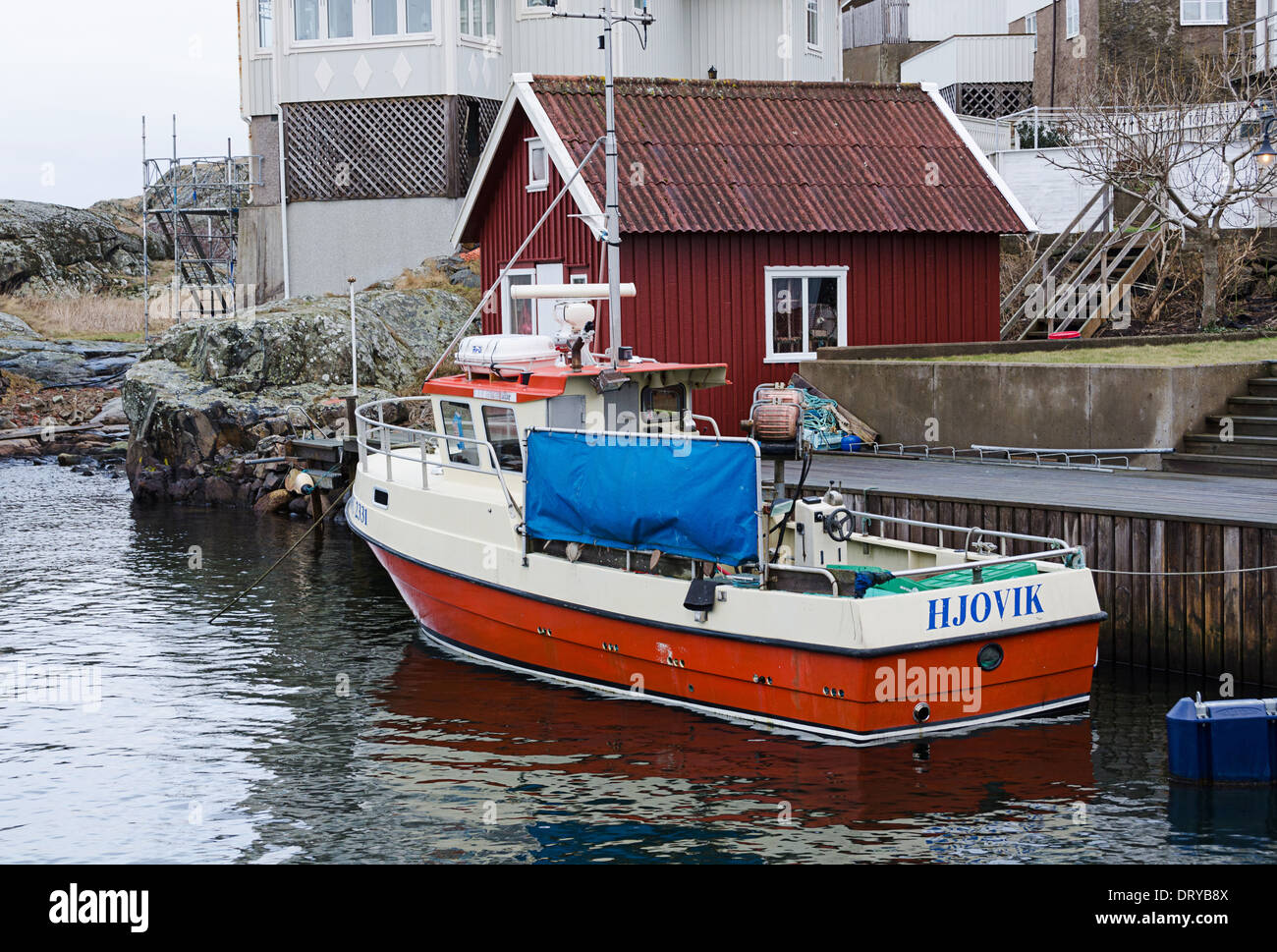 Fishing boat at the dock waiting to go out to sea Stock Photo - Alamy