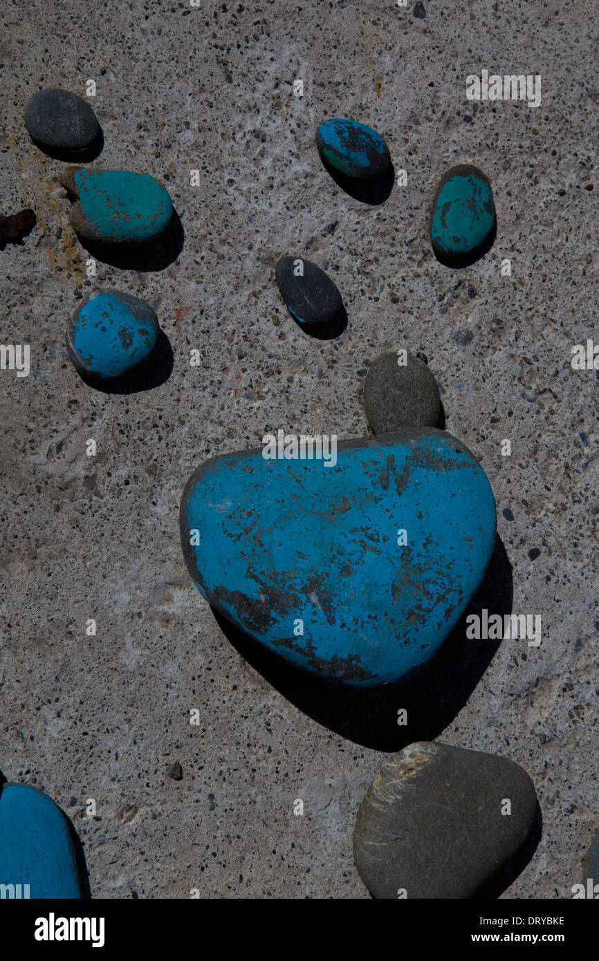Blue painted pebbles Stock Photo - Alamy