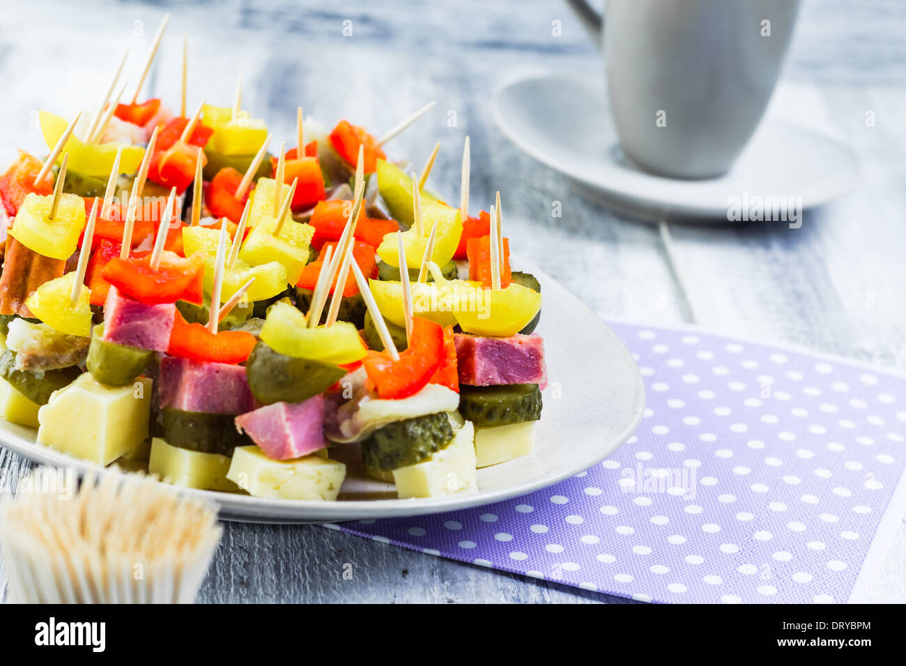 Finger foods on toothpicks as an appetizer Stock Photo - Alamy