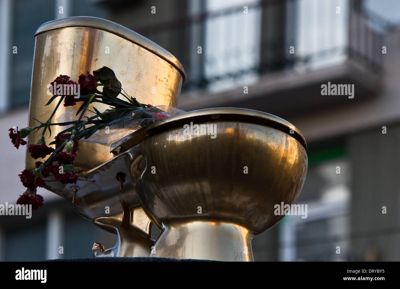 Kiev, Ukraine. 3rd Feb, 2014. Euromaidan activists put golden toilet ...