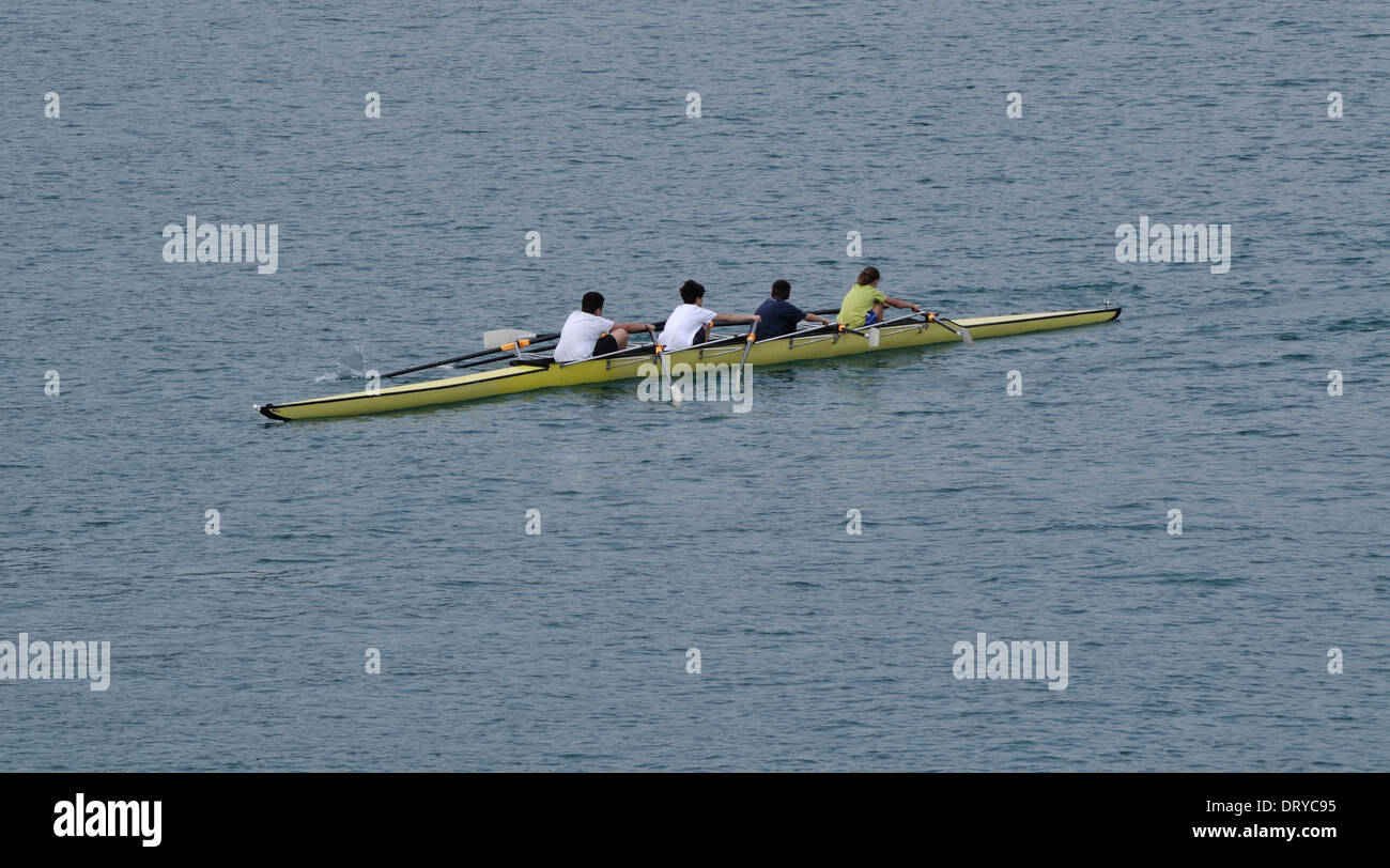 Coxless four rowing boat on Lake Garda Stock Photo - Alamy