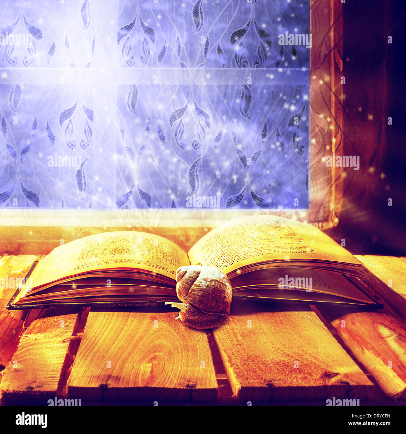 Open old book magic hi-res stock photography and images - Alamy