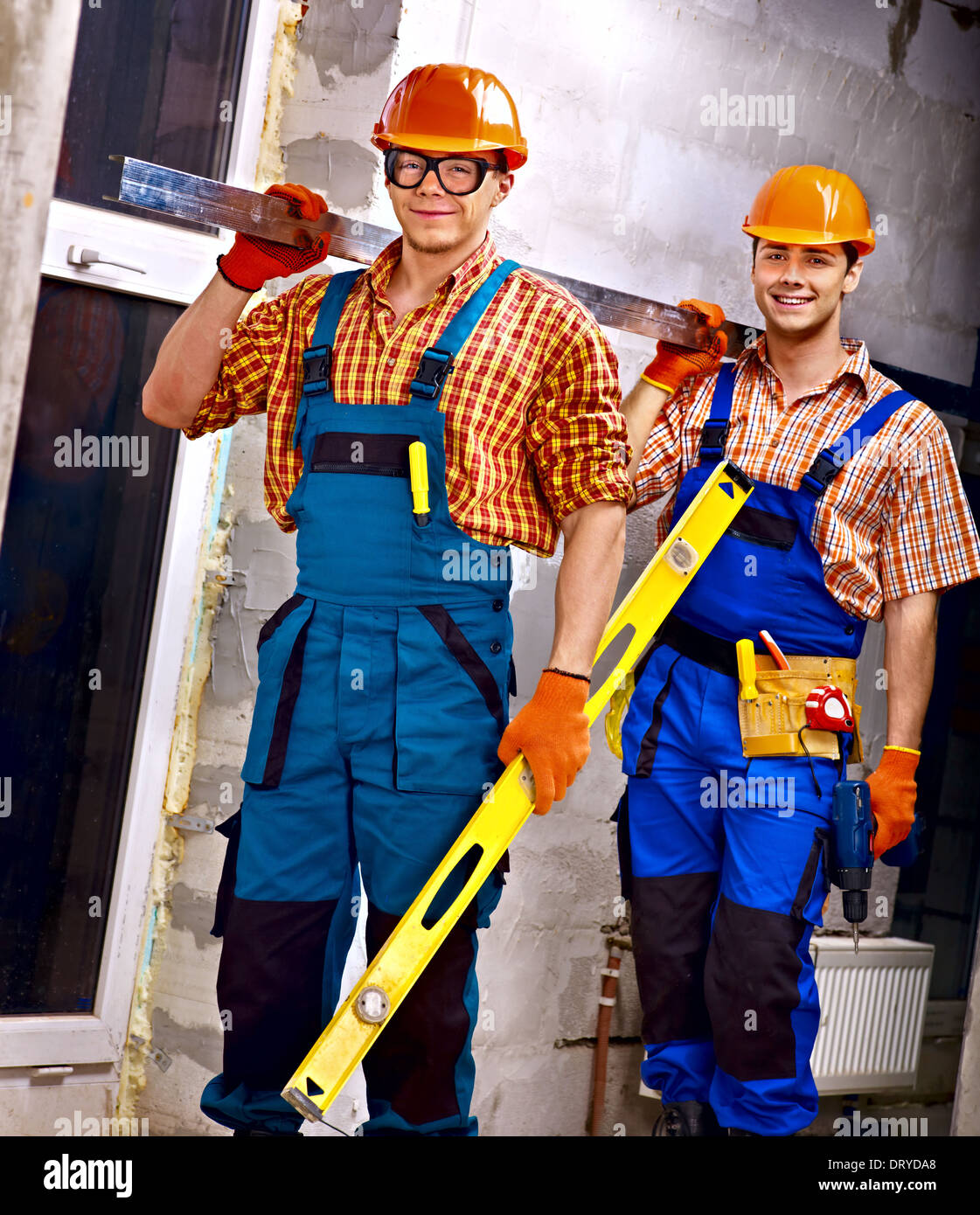 group people men in builder uniform indoor Stock Photo - Alamy