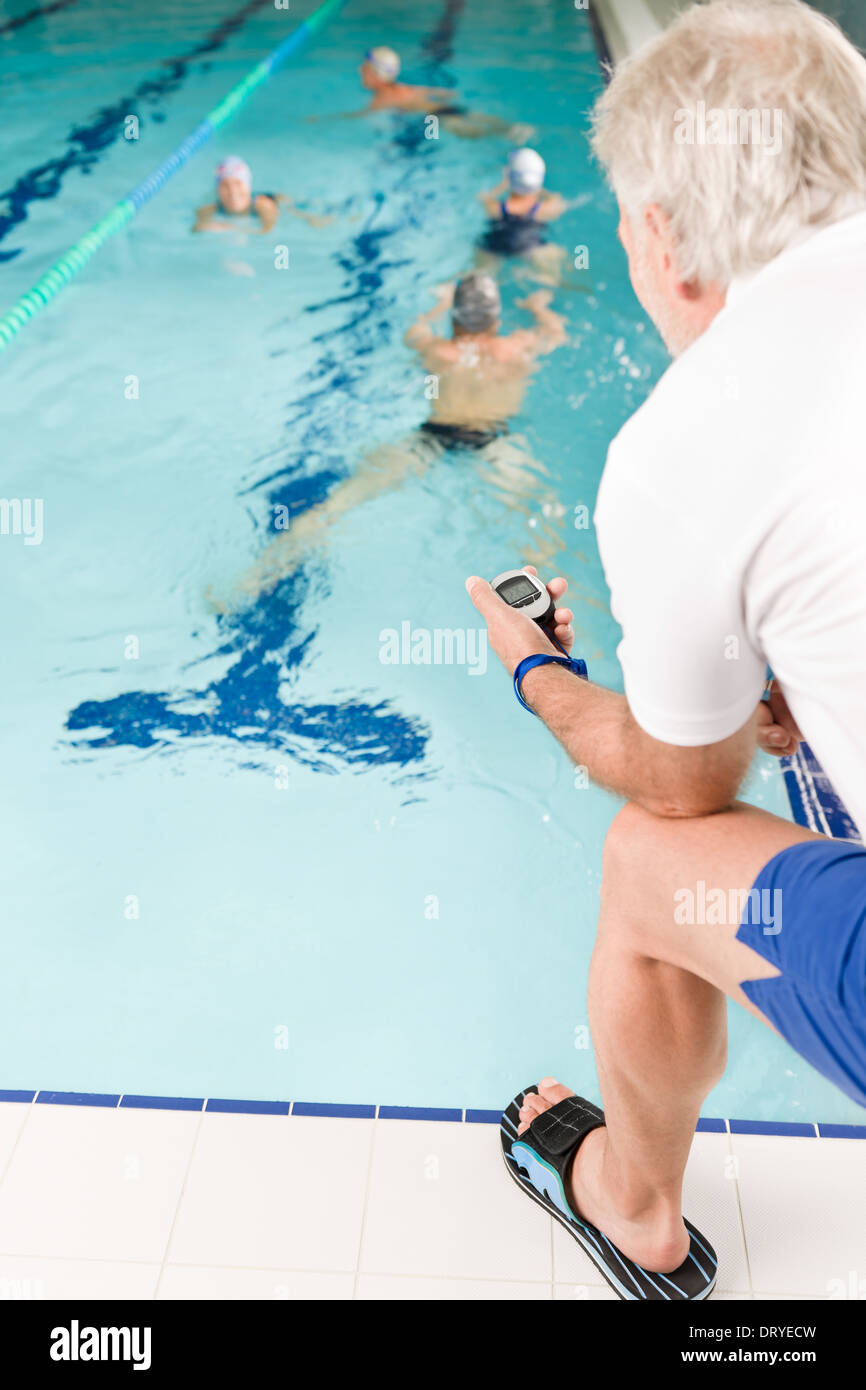 Pool coach - swimmer training competition Stock Photo - Alamy