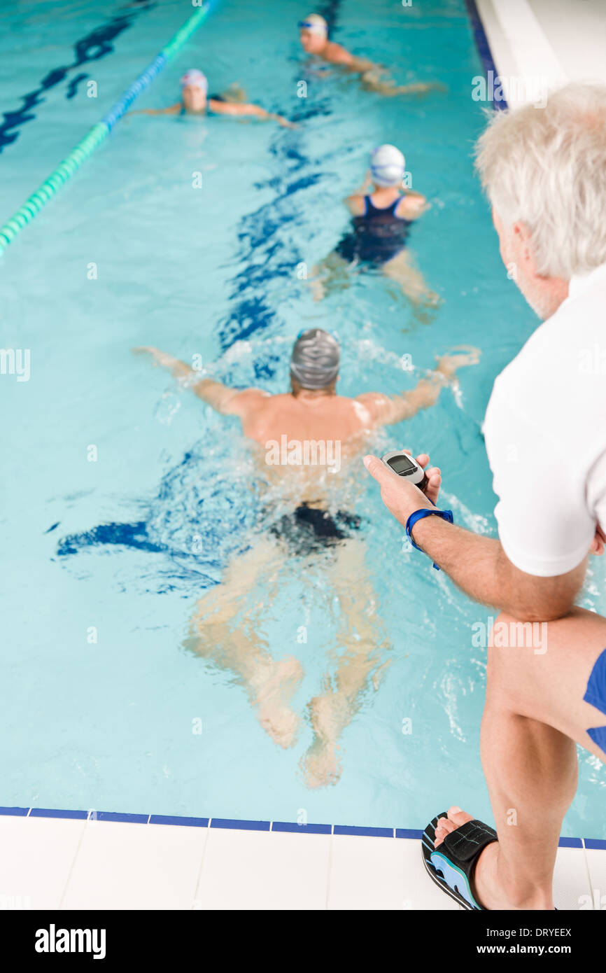Pool coach - swimmer training competition Stock Photo - Alamy