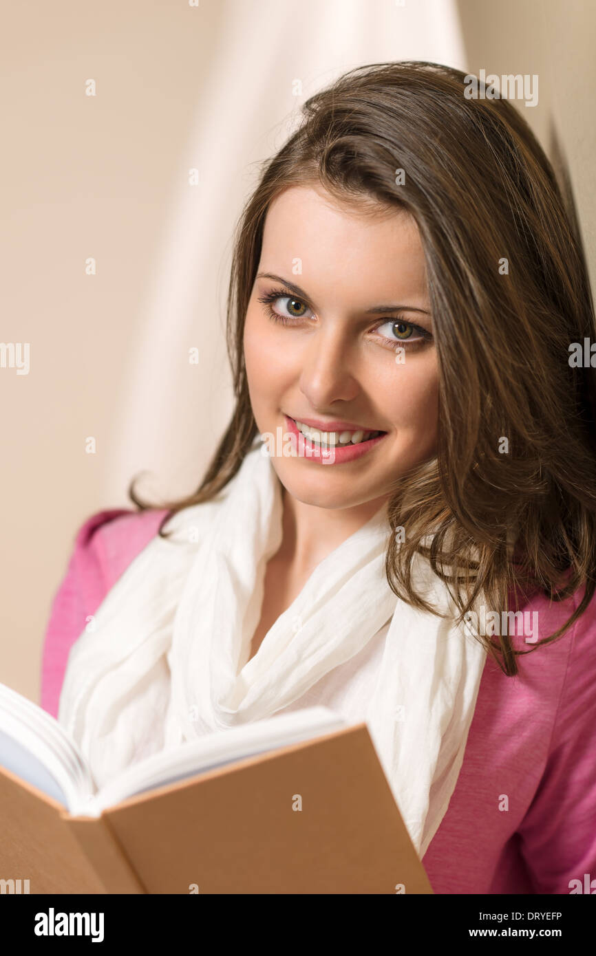 Beautiful young woman student hold book Stock Photo - Alamy