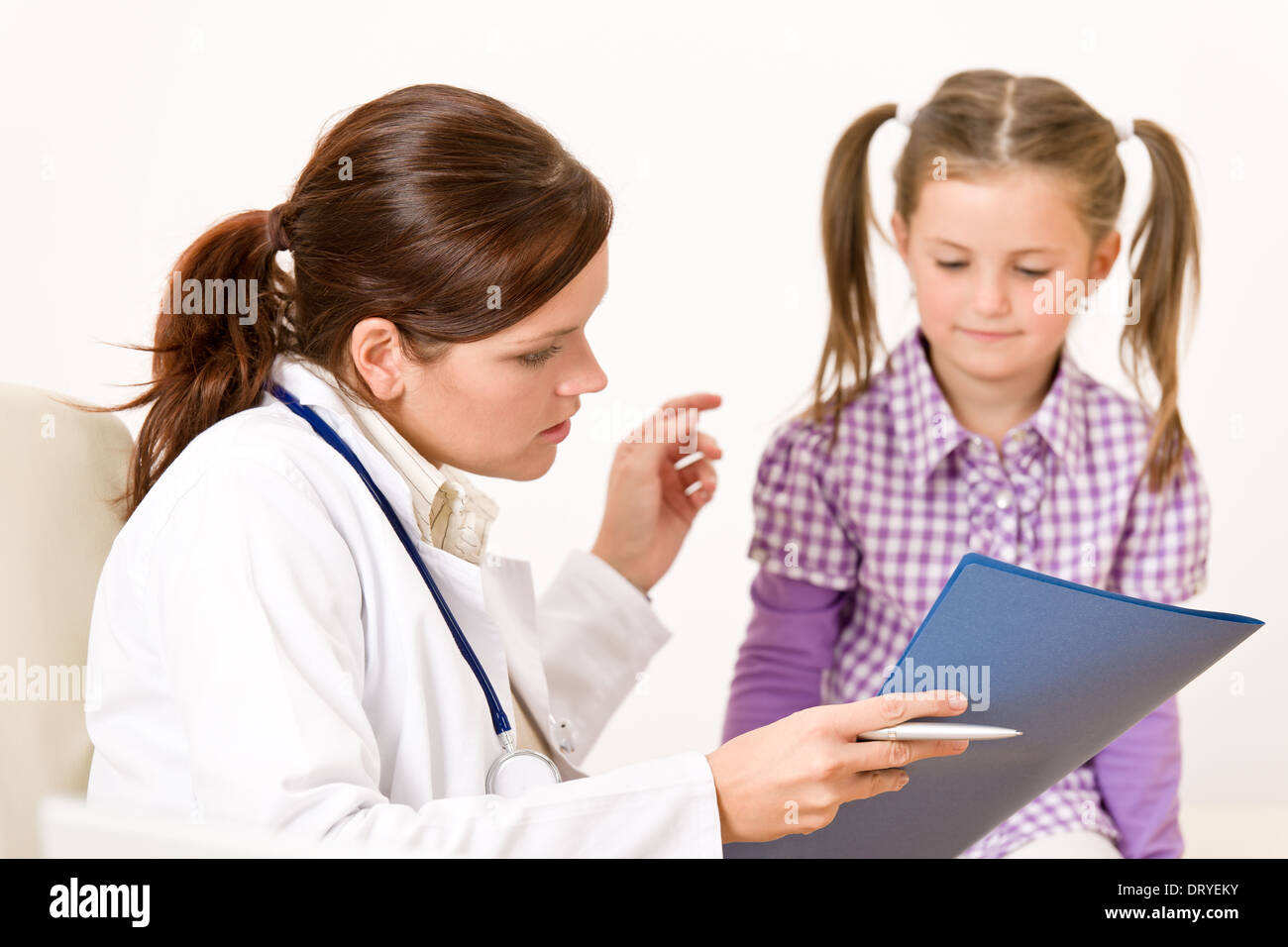 Female doctor with child at medical office Stock Photo - Alamy