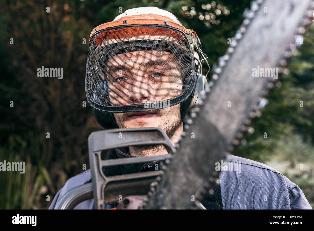 Holding chainsaw hi-res stock photography and images - Alamy