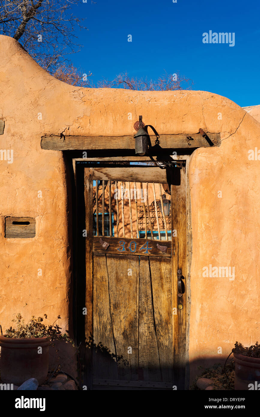 Entrance to courtyard of adobe-style home Stock Photo - Alamy