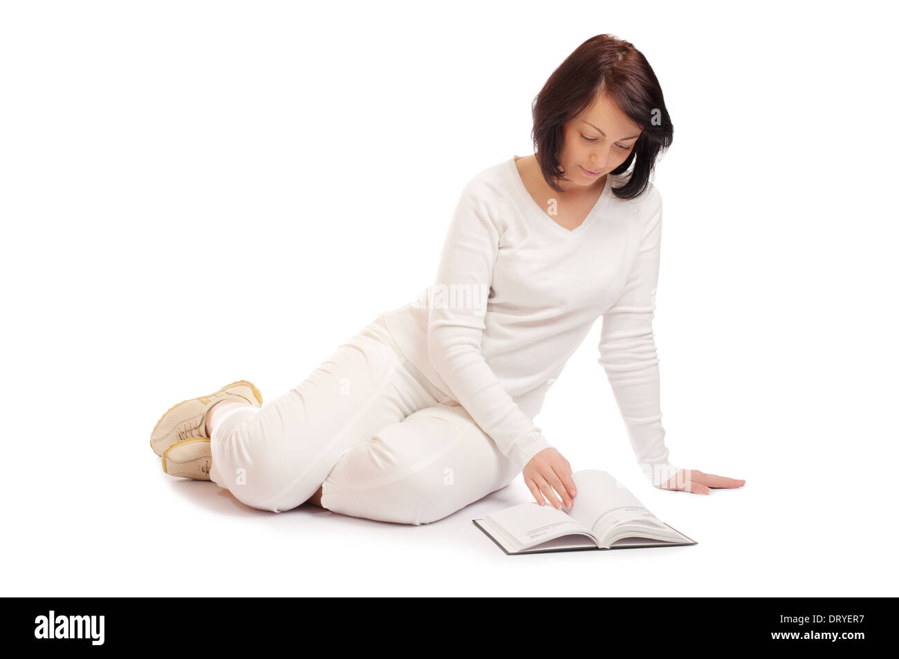 Young serious woman with book Stock Photo - Alamy