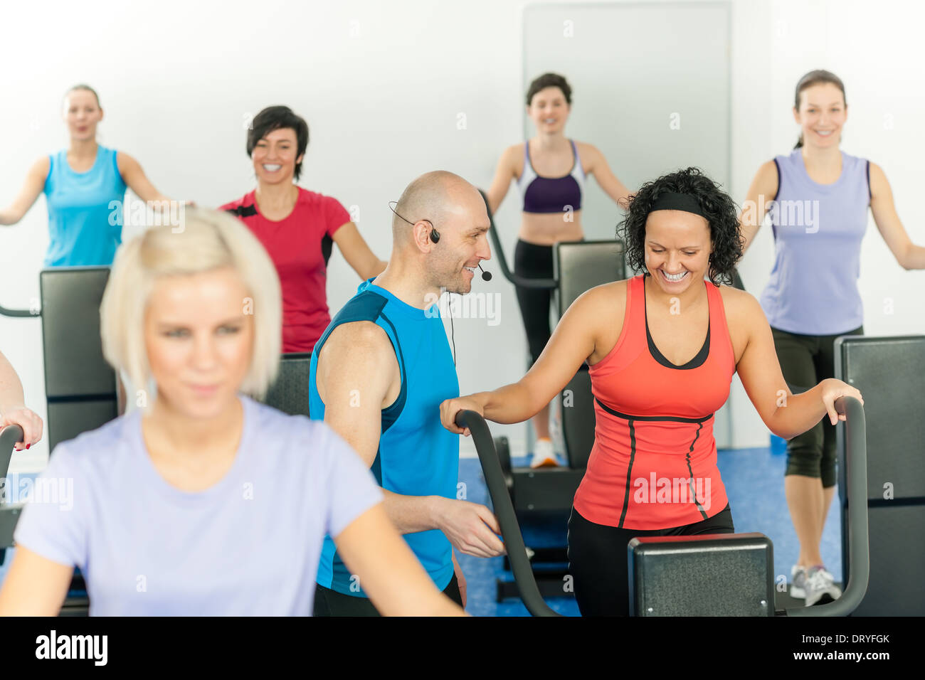 Female instructor leading group hi-res stock photography and images - Alamy