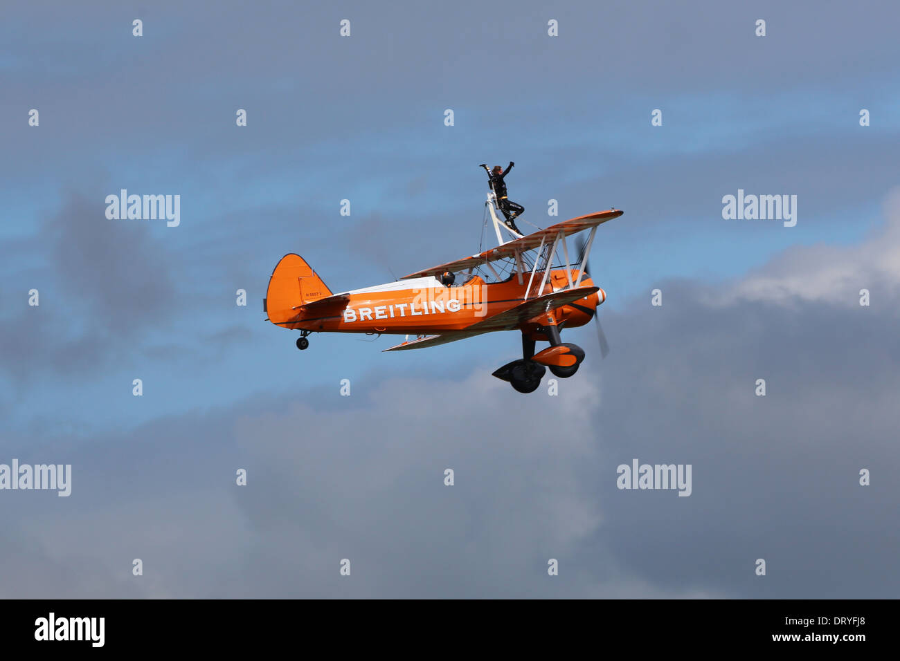 One of the Breitling wing-walking team displaying at the UK Flying ...