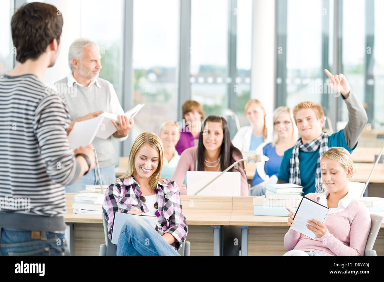 Group of students in classroom Stock Photo - Alamy