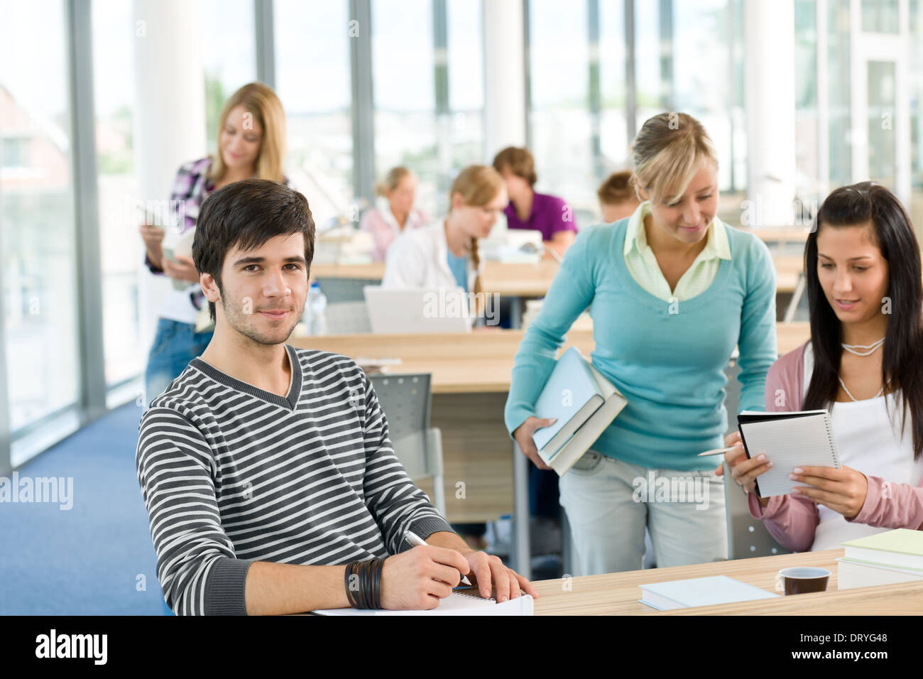 High school - three students in classroom Stock Photo - Alamy
