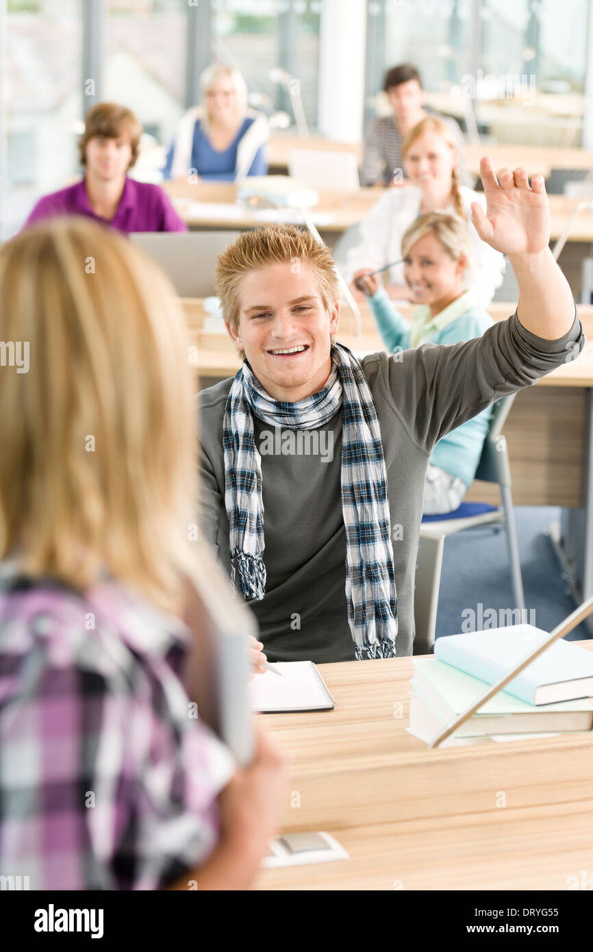 High school student raising hands Stock Photo - Alamy