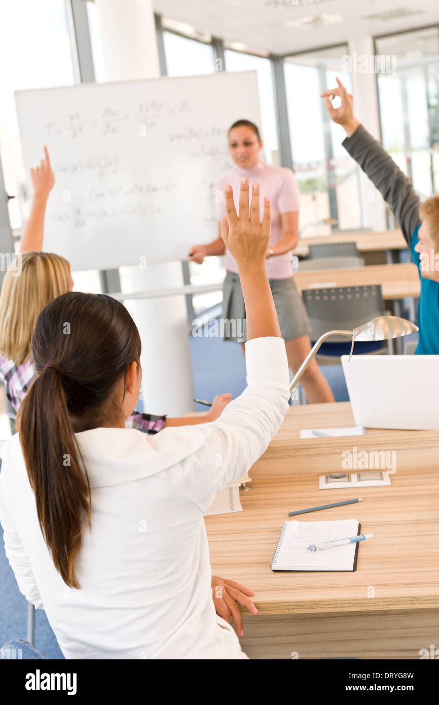 High school students raising hands Stock Photo - Alamy