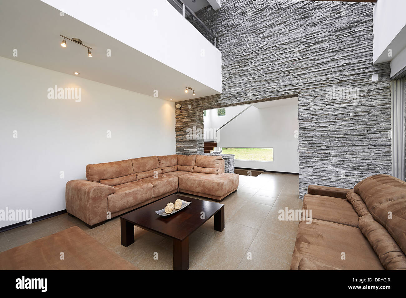 Interior design: Modern Living room with big empty white wall Stock ...