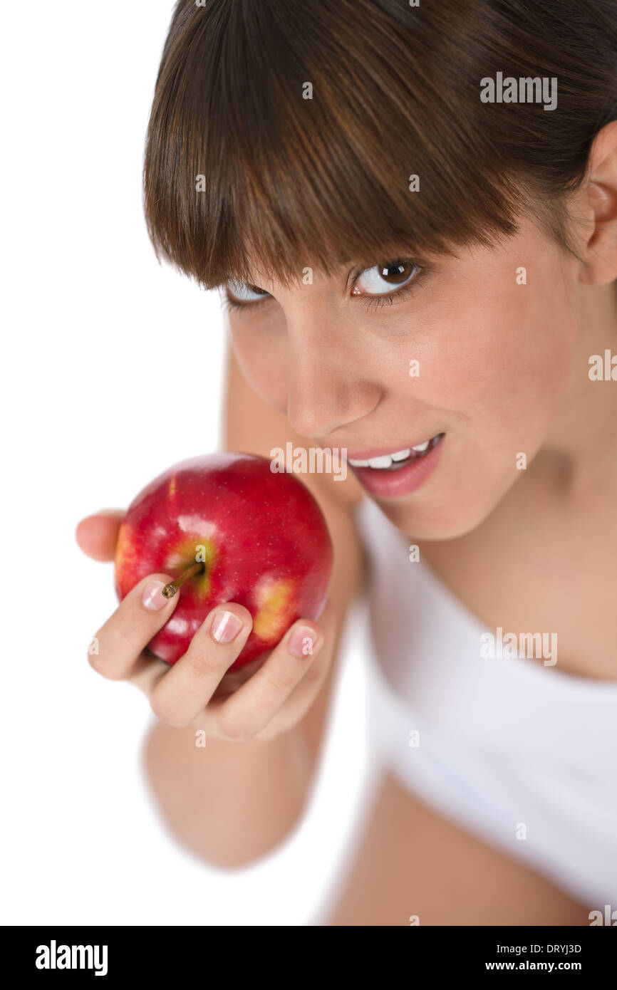 Female teenager eat red apple Stock Photo - Alamy