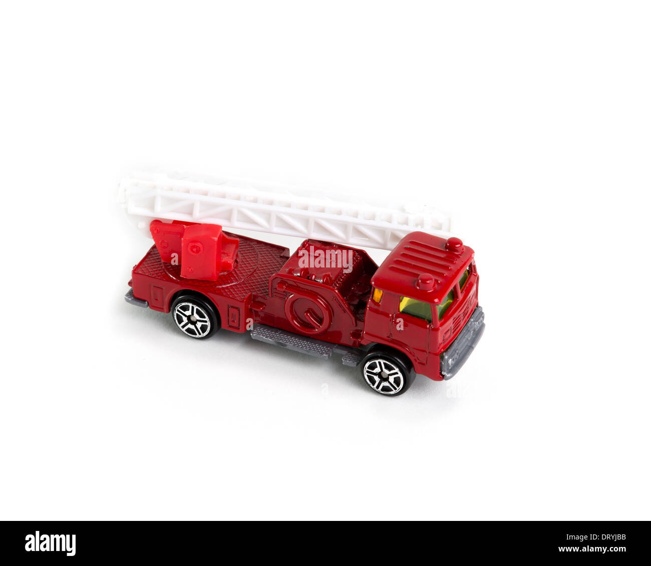 red fire truck toy on white background Stock Photo - Alamy