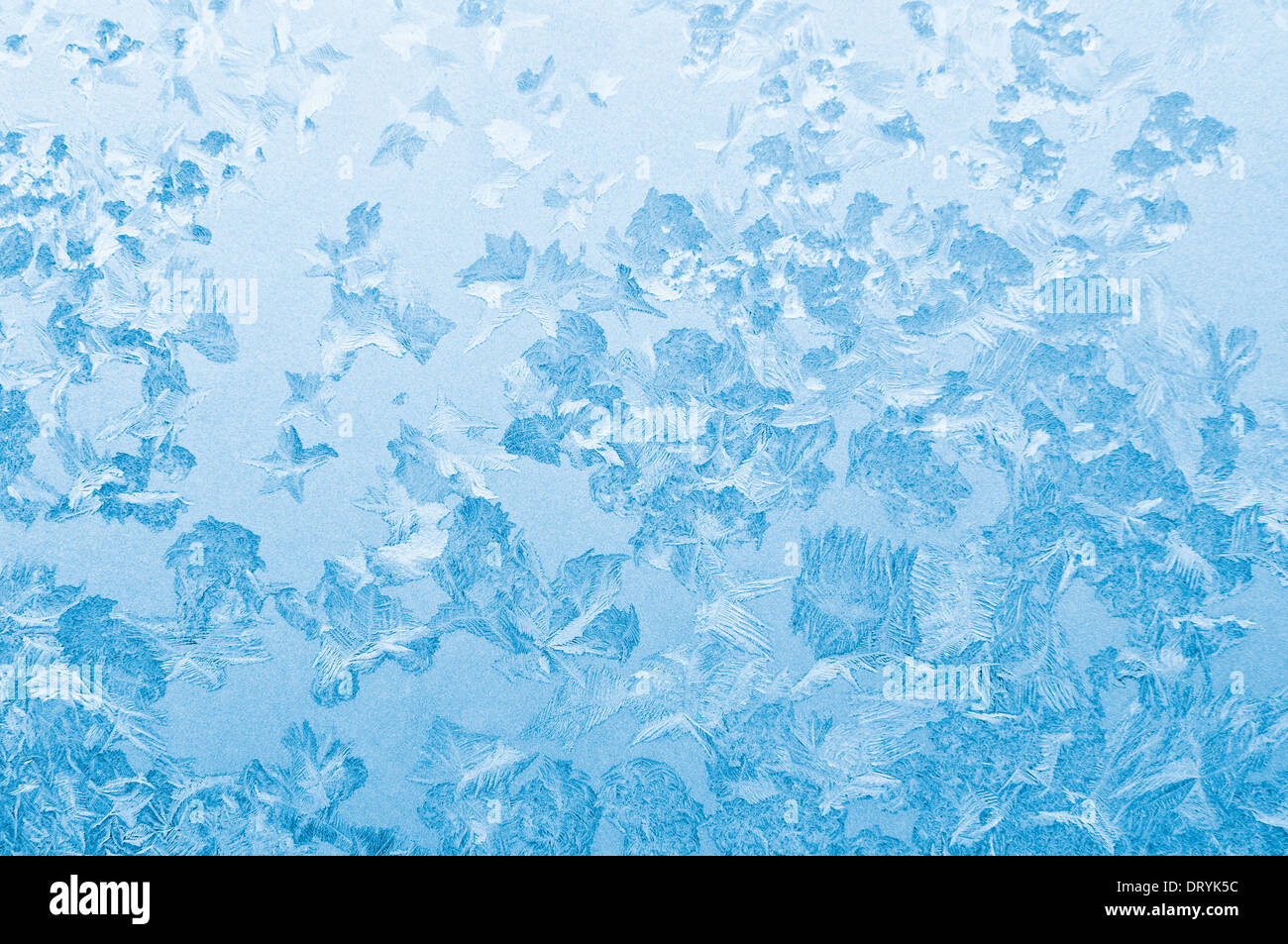 Light blue frozen window glass background Stock Photo - Alamy