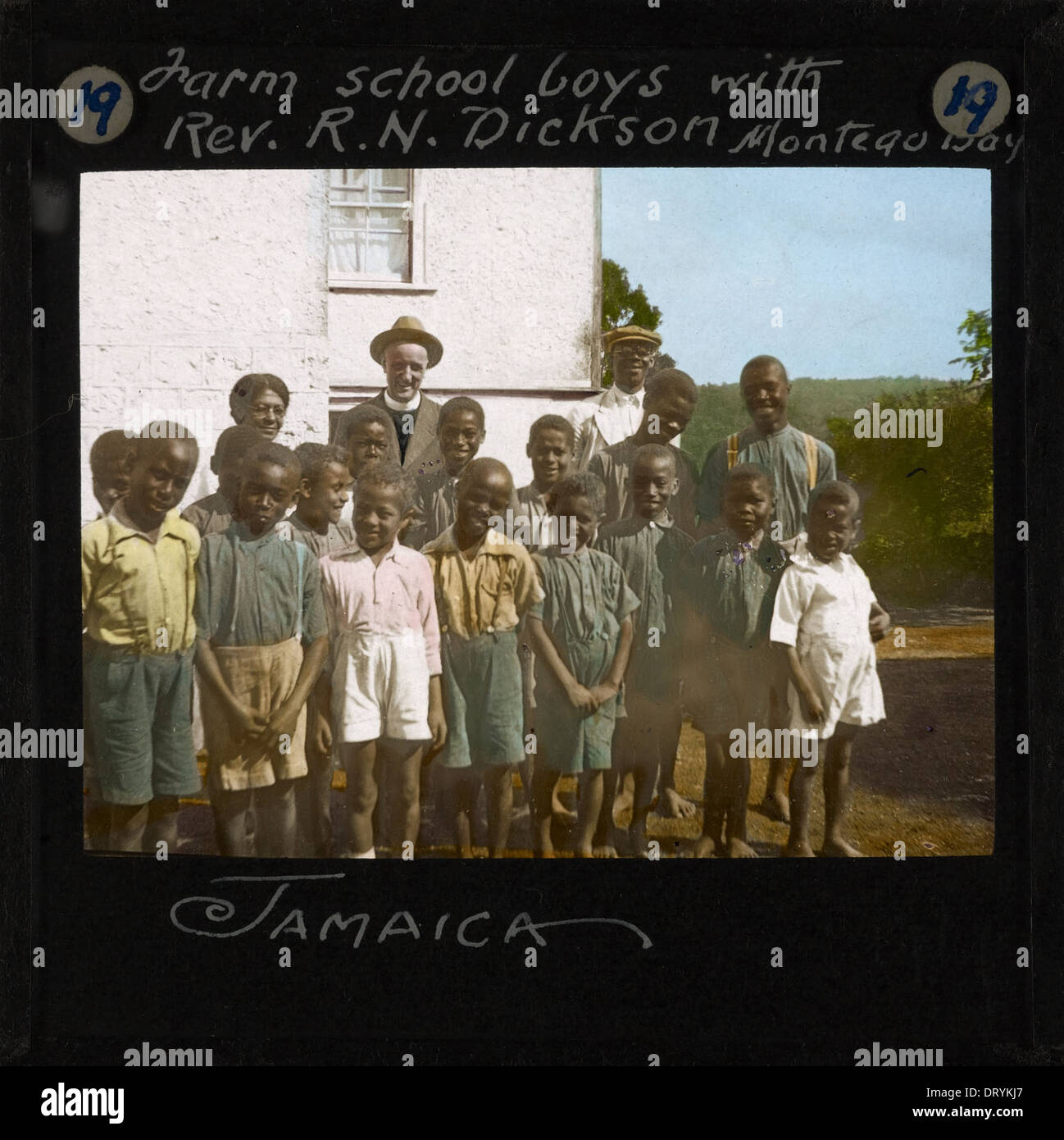 A photograph featuring Farm School boys with Rev. R.N. Dickson in ...