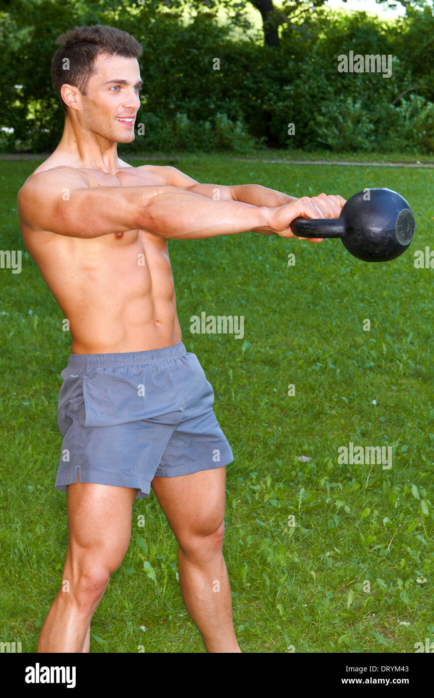 Doing exercises with weight Stock Photo - Alamy