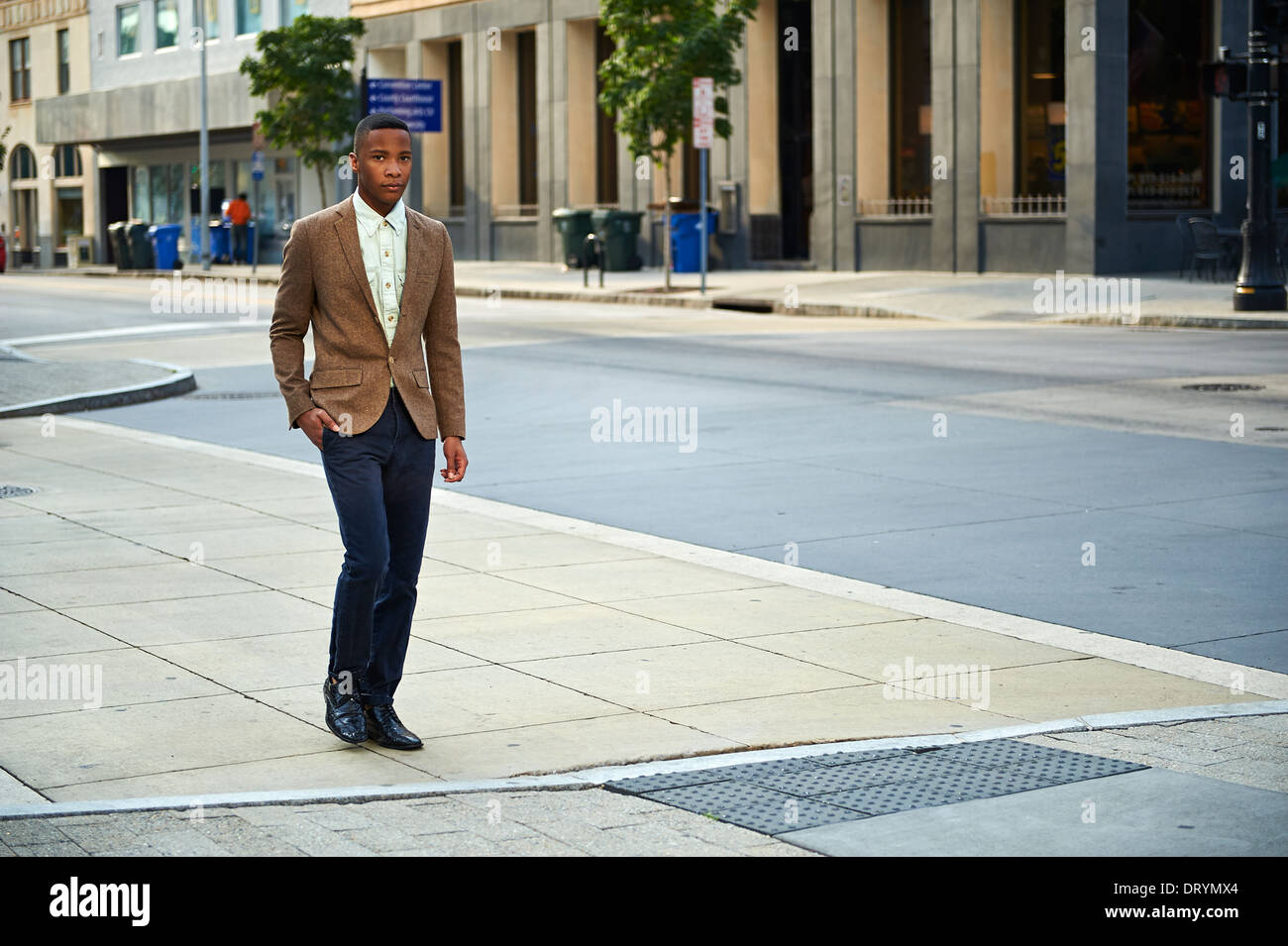 Joyful millennial guy walking hi-res stock photography and images - Alamy