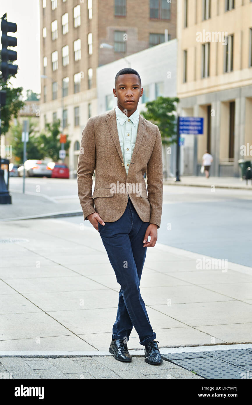 Young successful African - American business man walking in the city ...