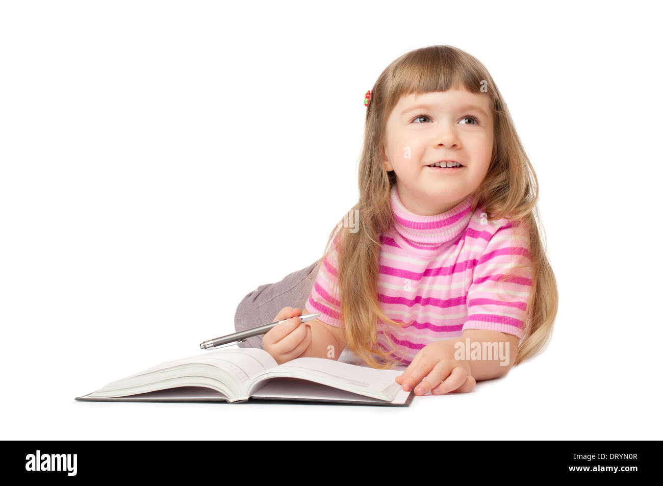 Smiling little writing girl Stock Photo - Alamy