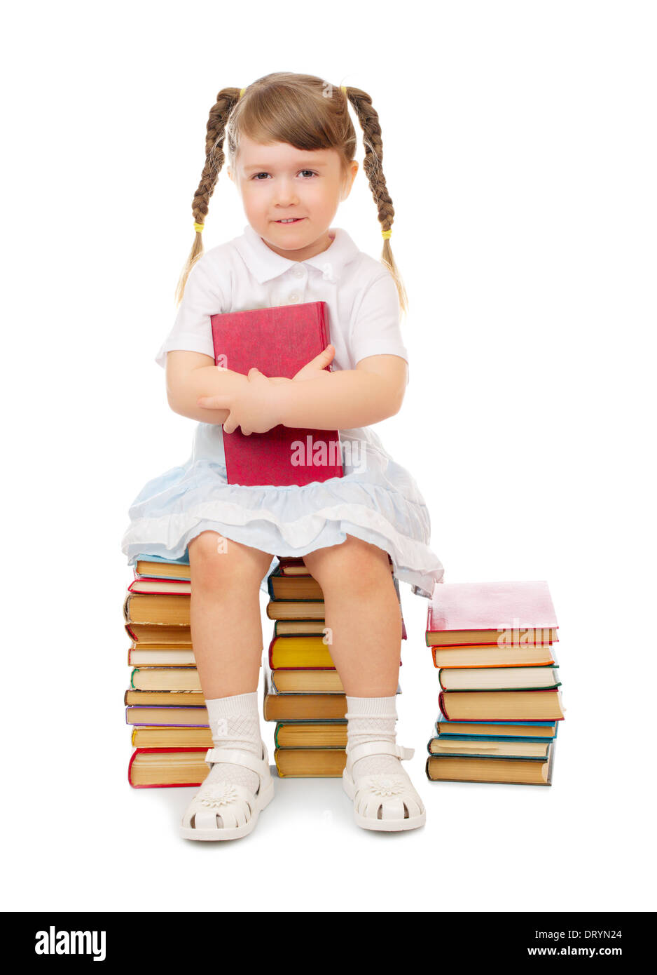 Little girl with book Stock Photo - Alamy