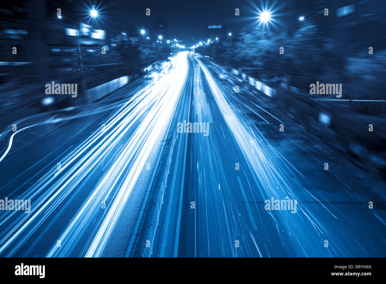 light trails on street at night Stock Photo - Alamy