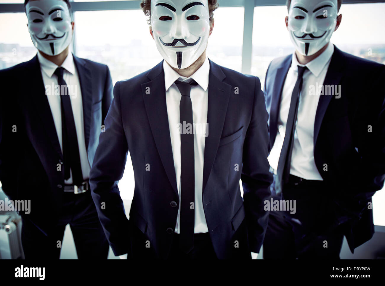 Three masked hi-res stock photography and images - Alamy