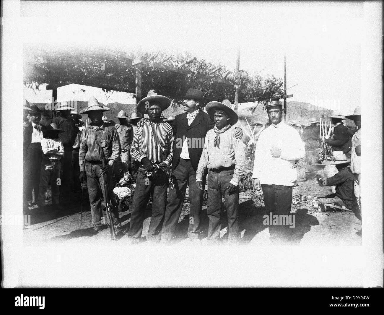 A historical photograph of a group of Yaqui Indians at the signing of a ...