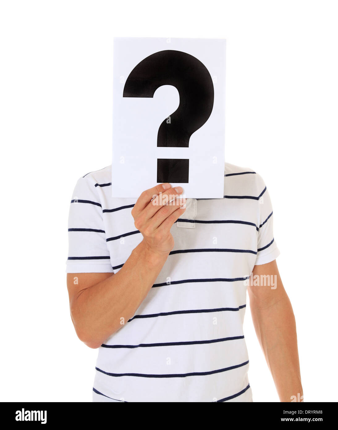 Male person holding huge question mark in front of his head. All on ...