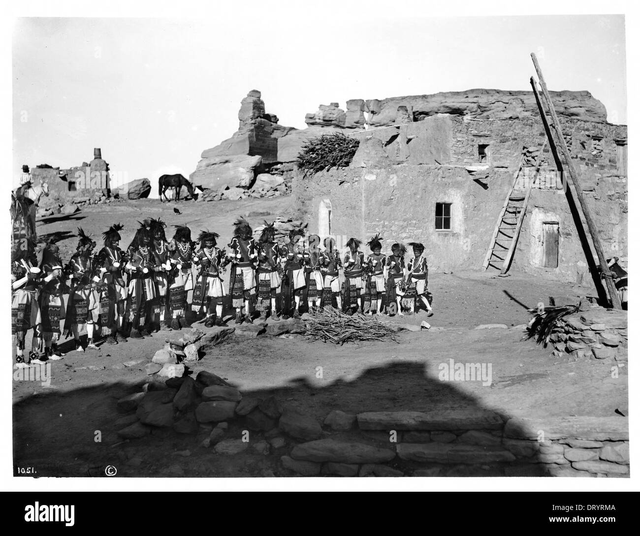 This photograph shows Antelope priests leaving the Kiva for the Hopi ...